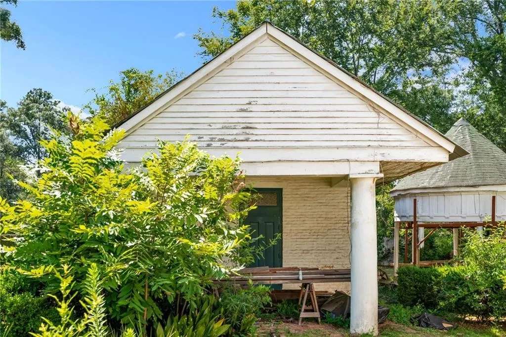 c. 1840 Greek Revival in Clinton, LA - Old House Dreams